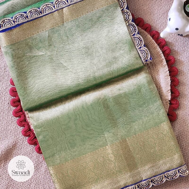 Anokhi – Elegant Green Tissue Saree with Lace Borders – Swaadi